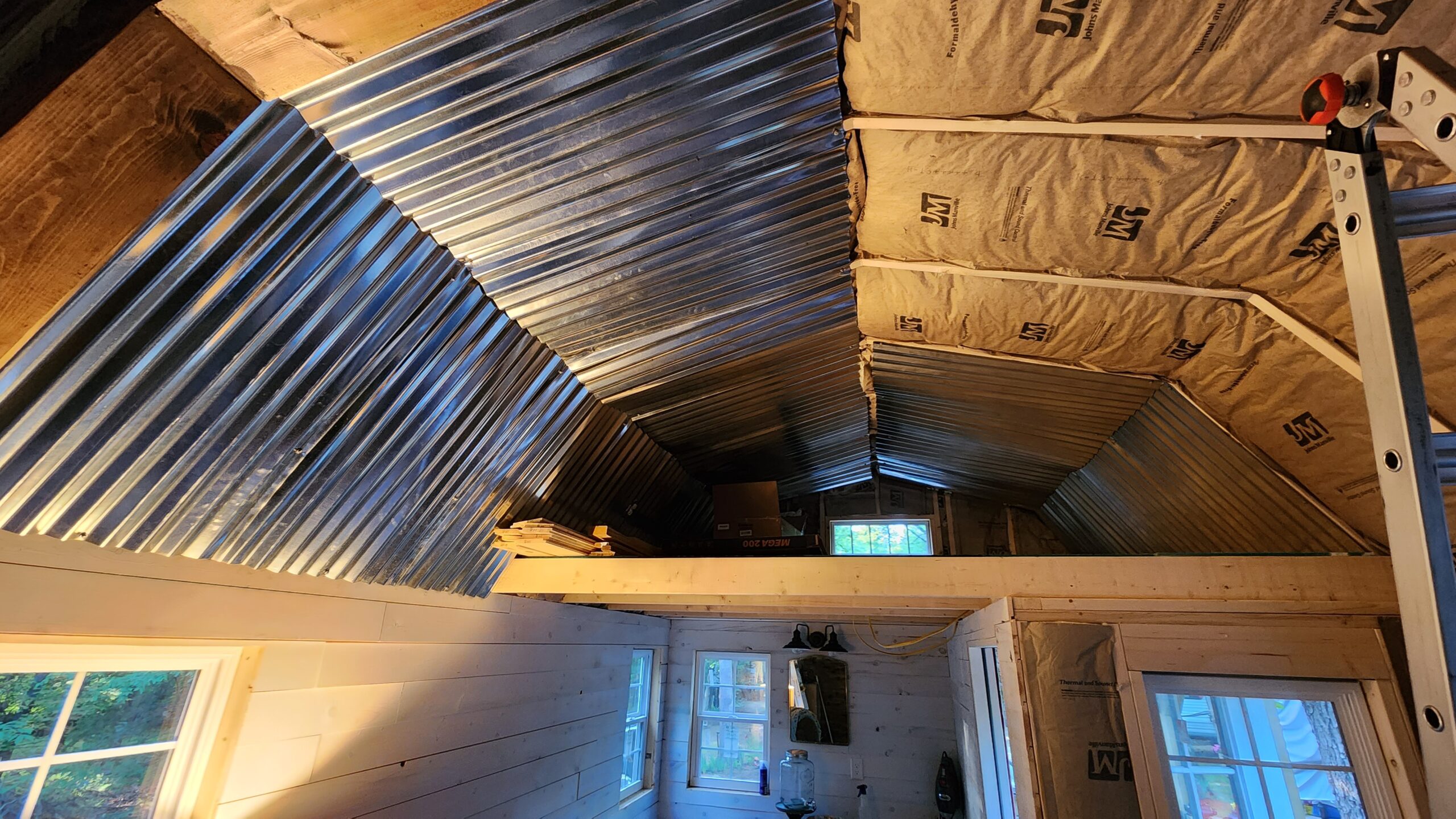 Progress on the tin roof ceiling installation